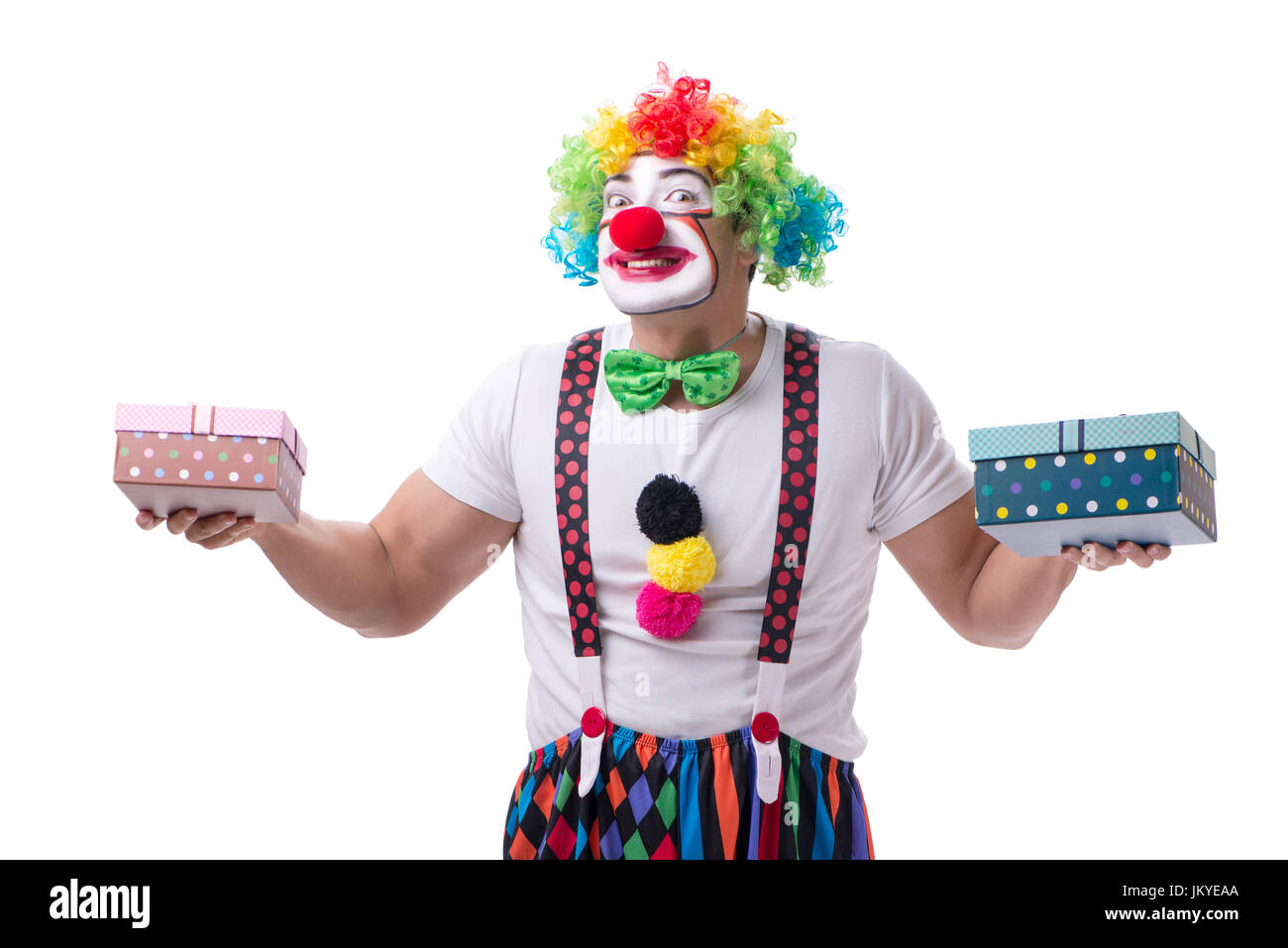 Funny clown with a gift present box isolated on white background Stock ...