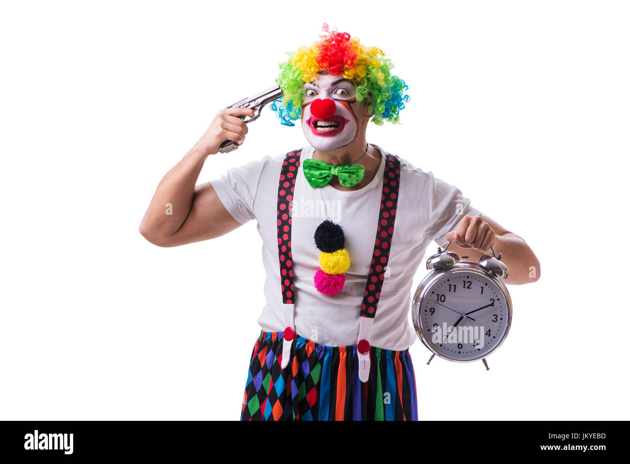 Funny clown with an alarm clock isolated on white background Stock ...