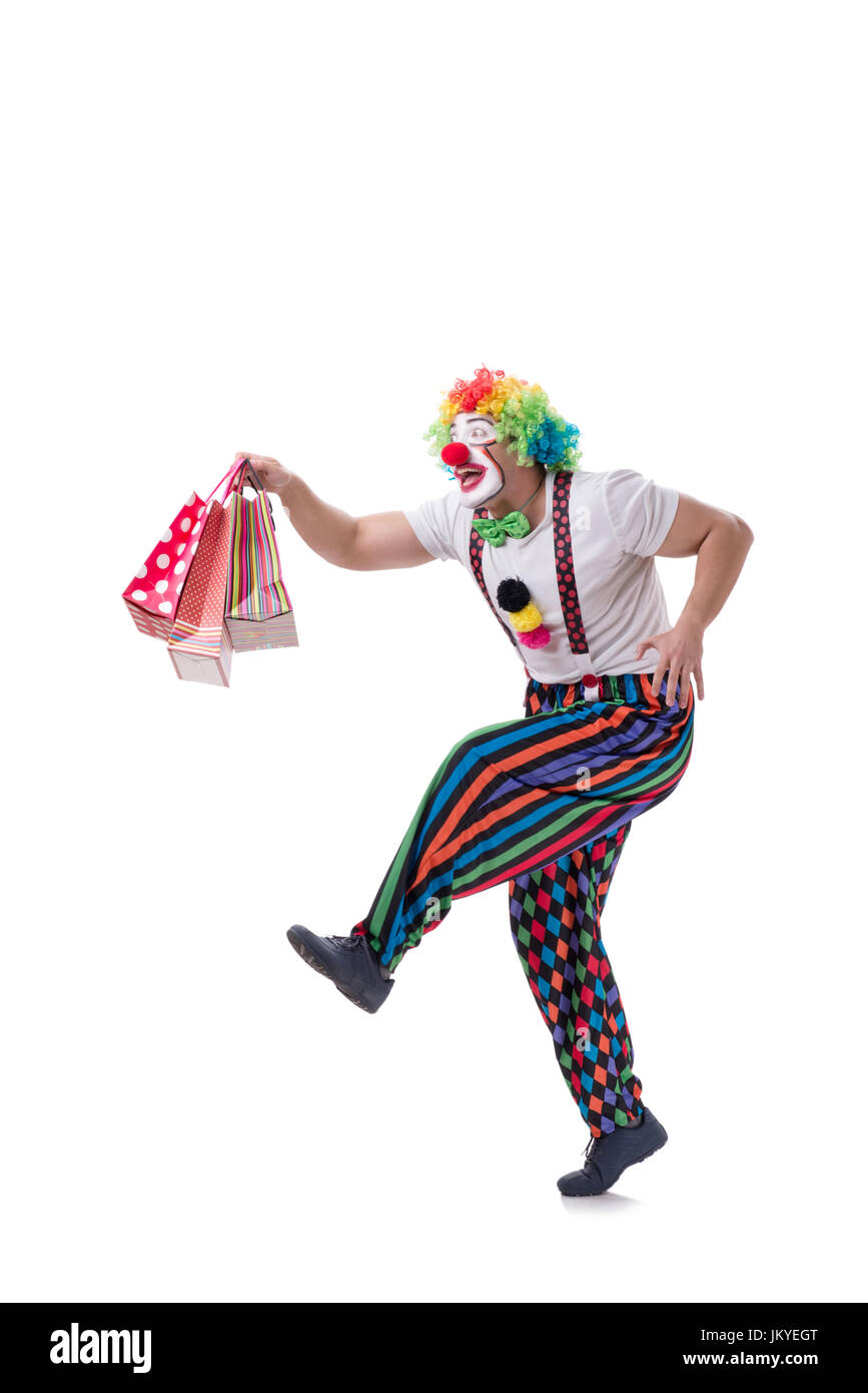 Funny clown with shopping bags isolated on white background Stock Photo ...