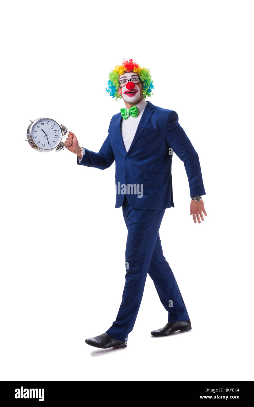 Funny clown businessman with an alarm clock isolated on white backgound ...