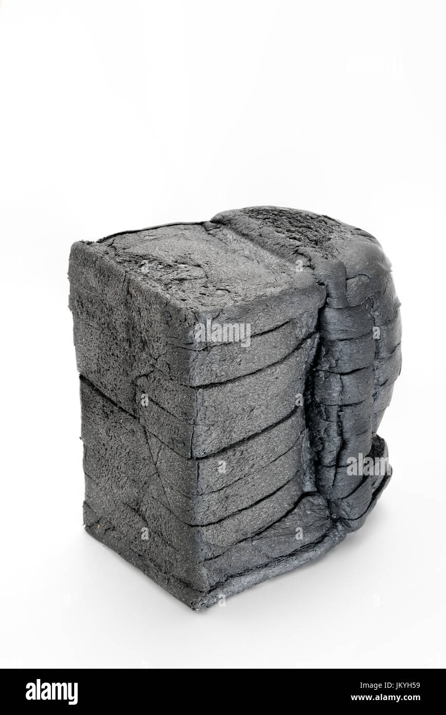 loaf slide of charcoal bread black bread isolated on white background ...