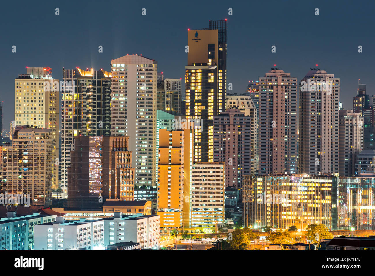 Modern building in night time background Stock Photo - Alamy