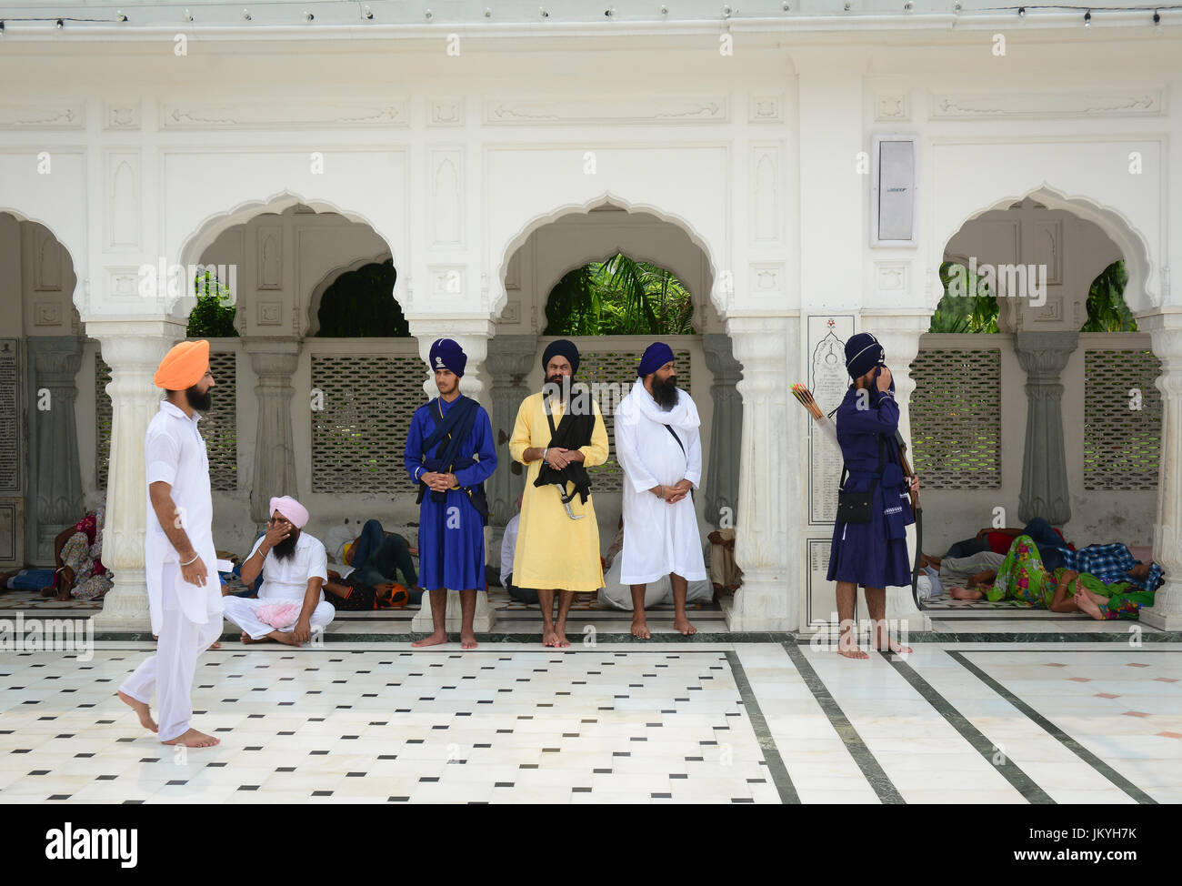 Amritsar, India - Jul 25, 2015. Many Sikh people walk at the Golden ...