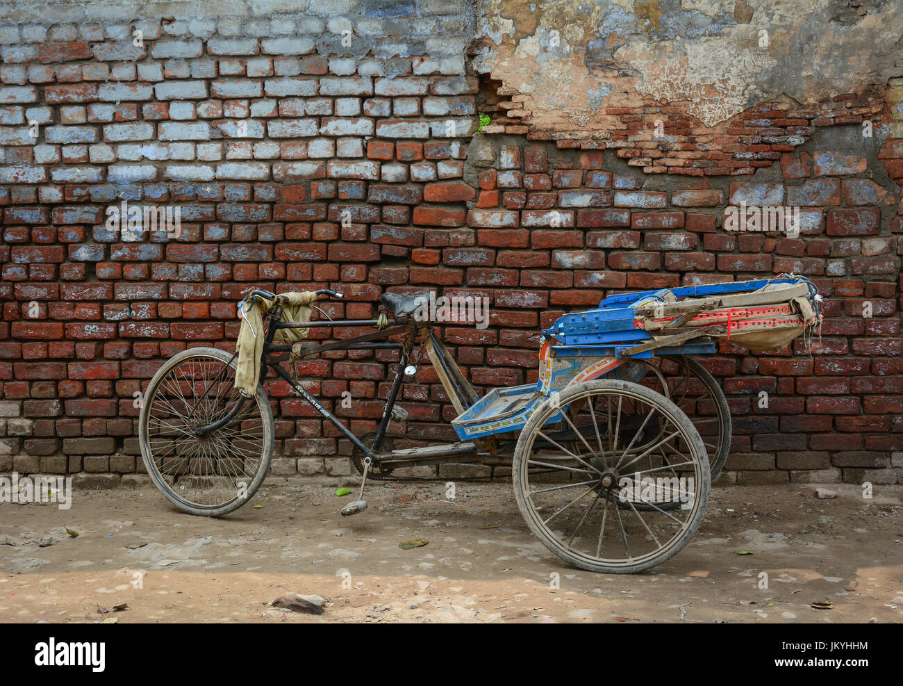 A rickshaw parking on street at old town in Amritsar, India Stock Photo ...