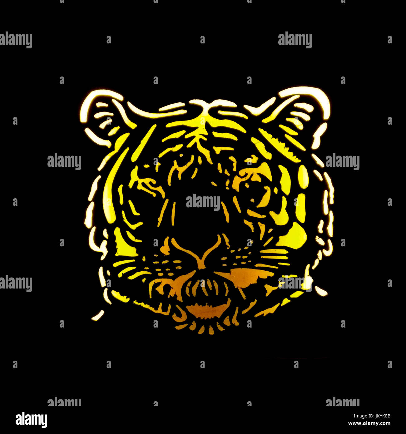 Backlit metal cutout of a tiger face Stock Photo - Alamy