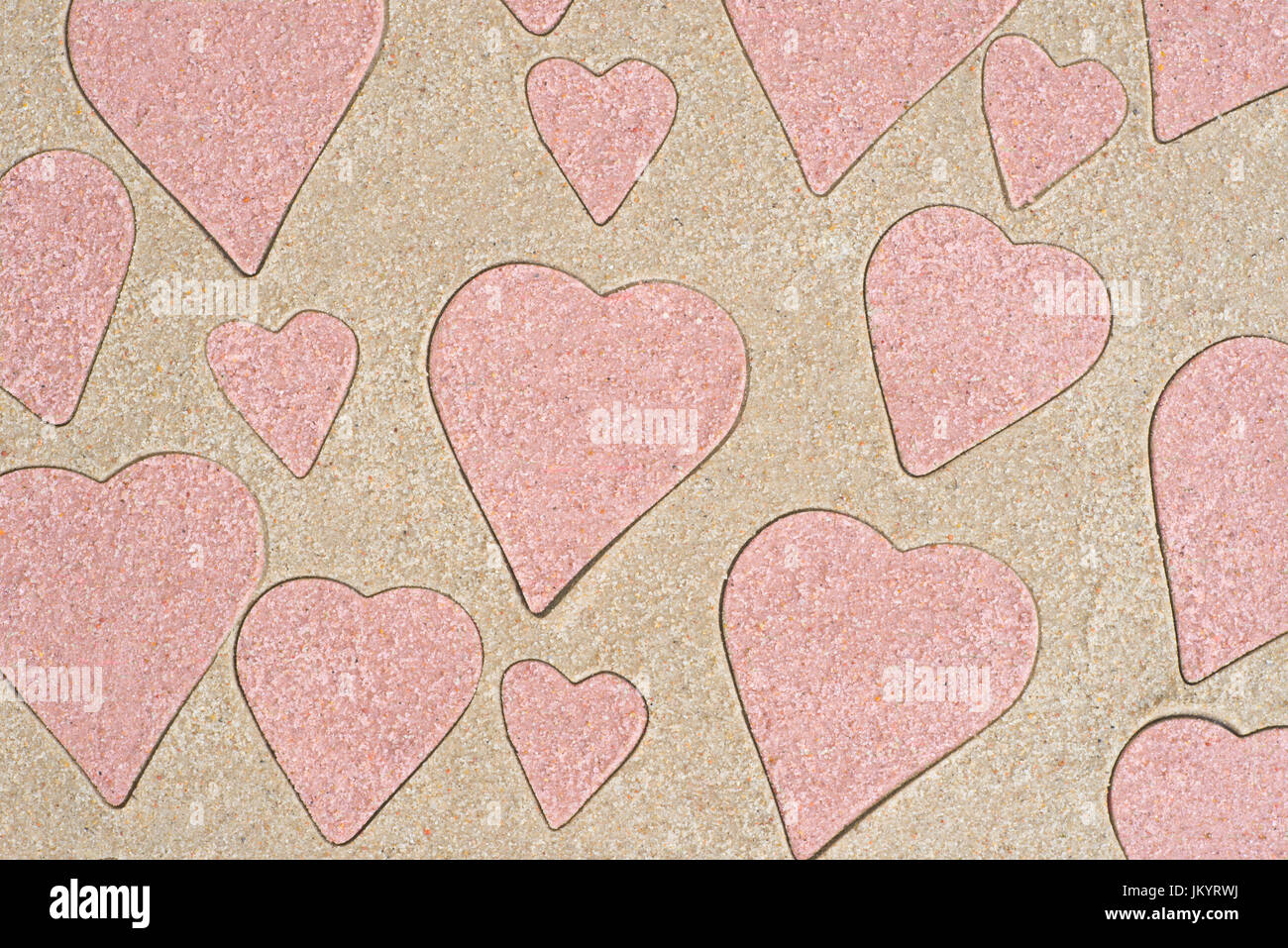 heart shapes pattern drawing in sand background Stock Photo - Alamy