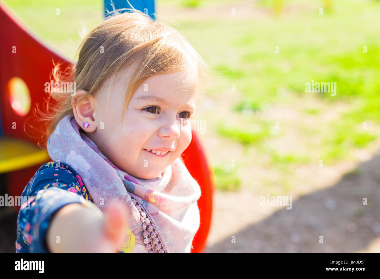 happy pretty child girl showing thumbs up Stock Photo - Alamy