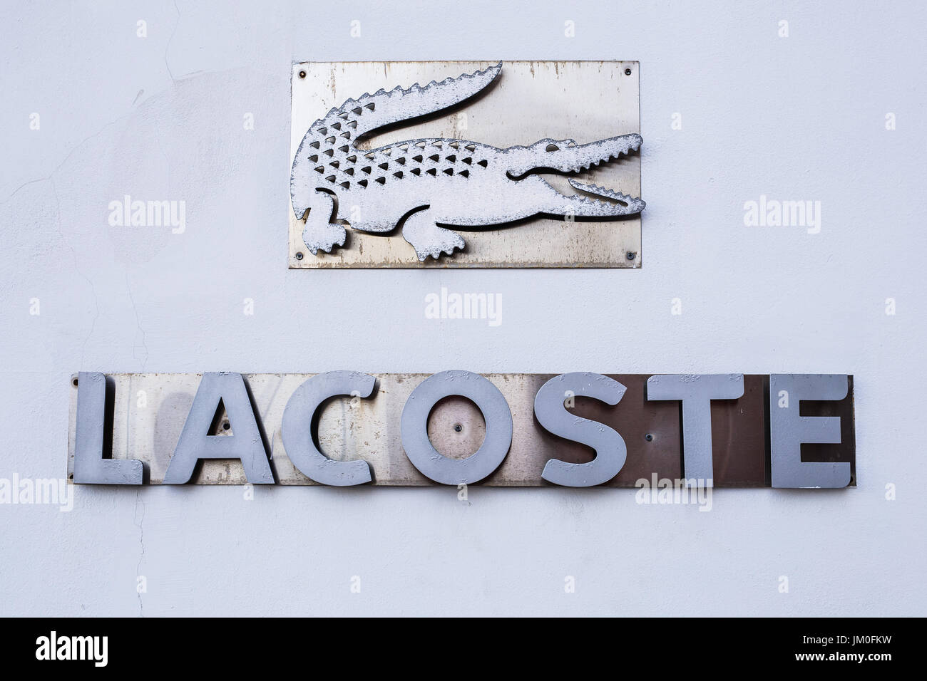 Lacoste logo street view hi-res stock photography and images - Alamy