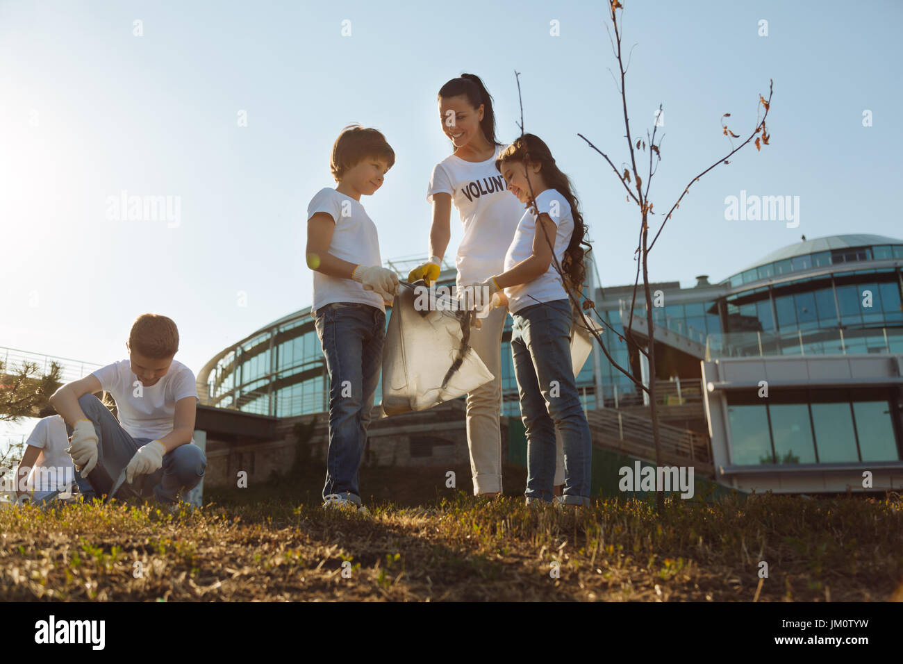 Little children doing their social tasks Stock Photo - Alamy