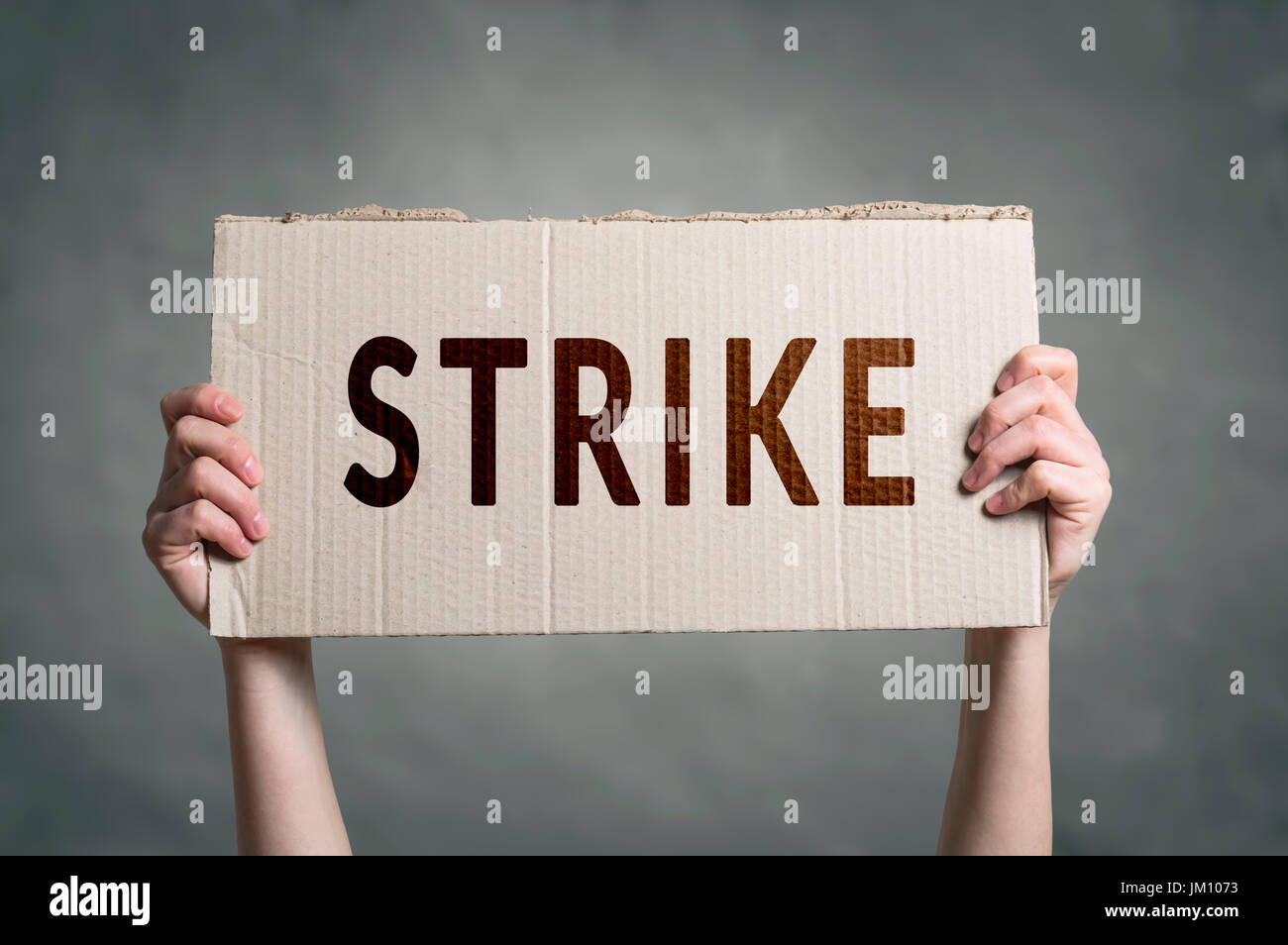 Holding protest signs hi-res stock photography and images - Alamy