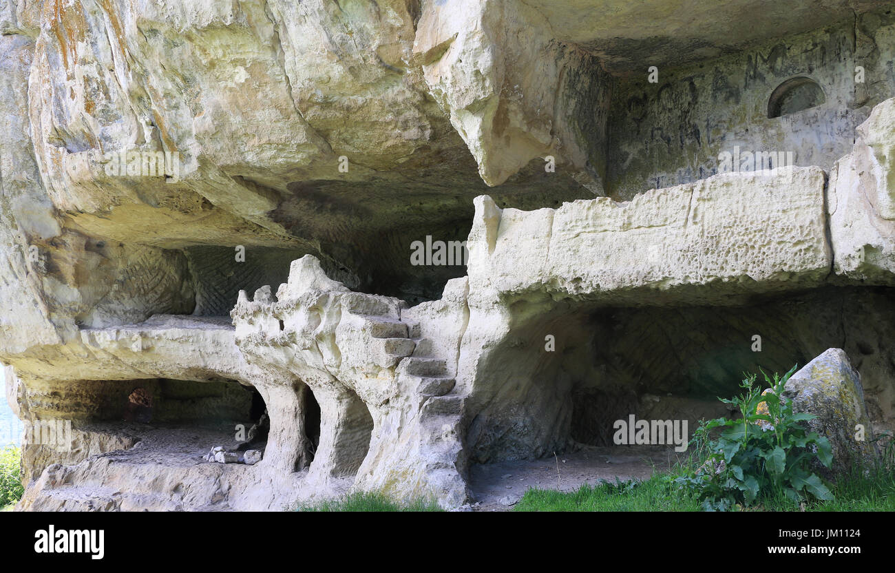 Caves in the cave town Tepe Kermen in Crimea Stock Photo - Alamy
