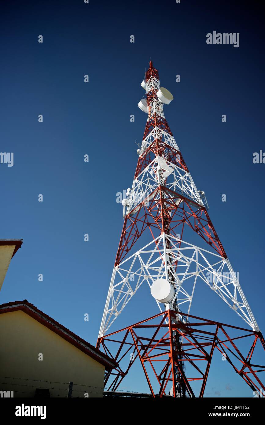 Telecommunications tower with clear blue sky Stock Photo - Alamy
