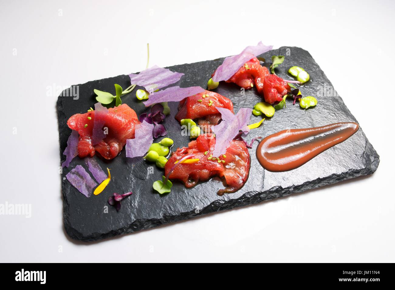 Red tuna sashimi on a slate plate Stock Photo - Alamy