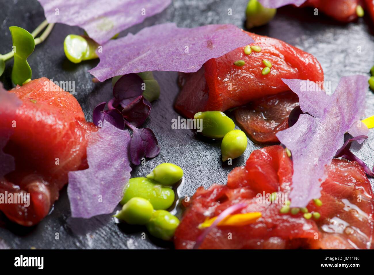Red tuna sashimi on a slate plate Stock Photo - Alamy