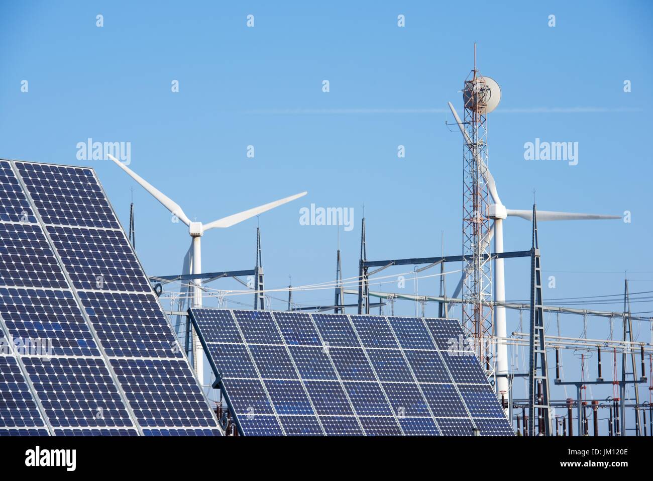 Windmills and photovoltaic panels for energy production, Navarra, Spain ...