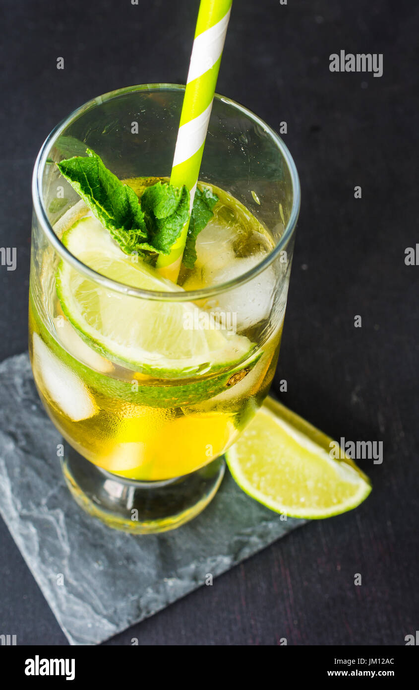 Summer drink glass of water with ice on dark background Stock Photo - Alamy