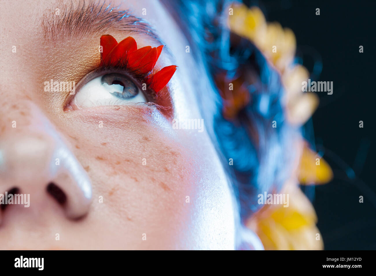 Eyelashes like petals of flowers. Beautiful young girl in the image of ...