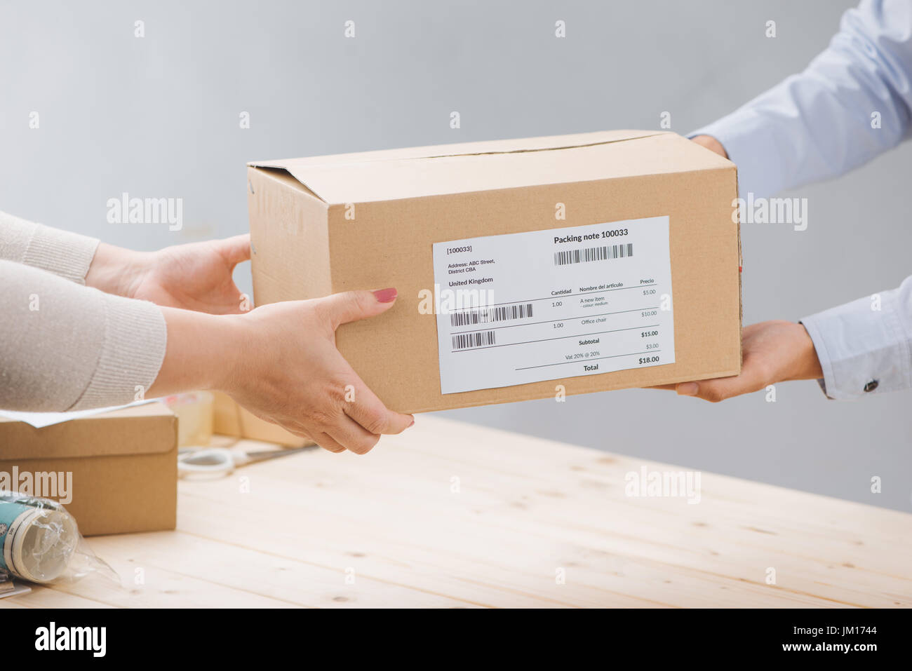 Woman receiving package food hi-res stock photography and images - Alamy