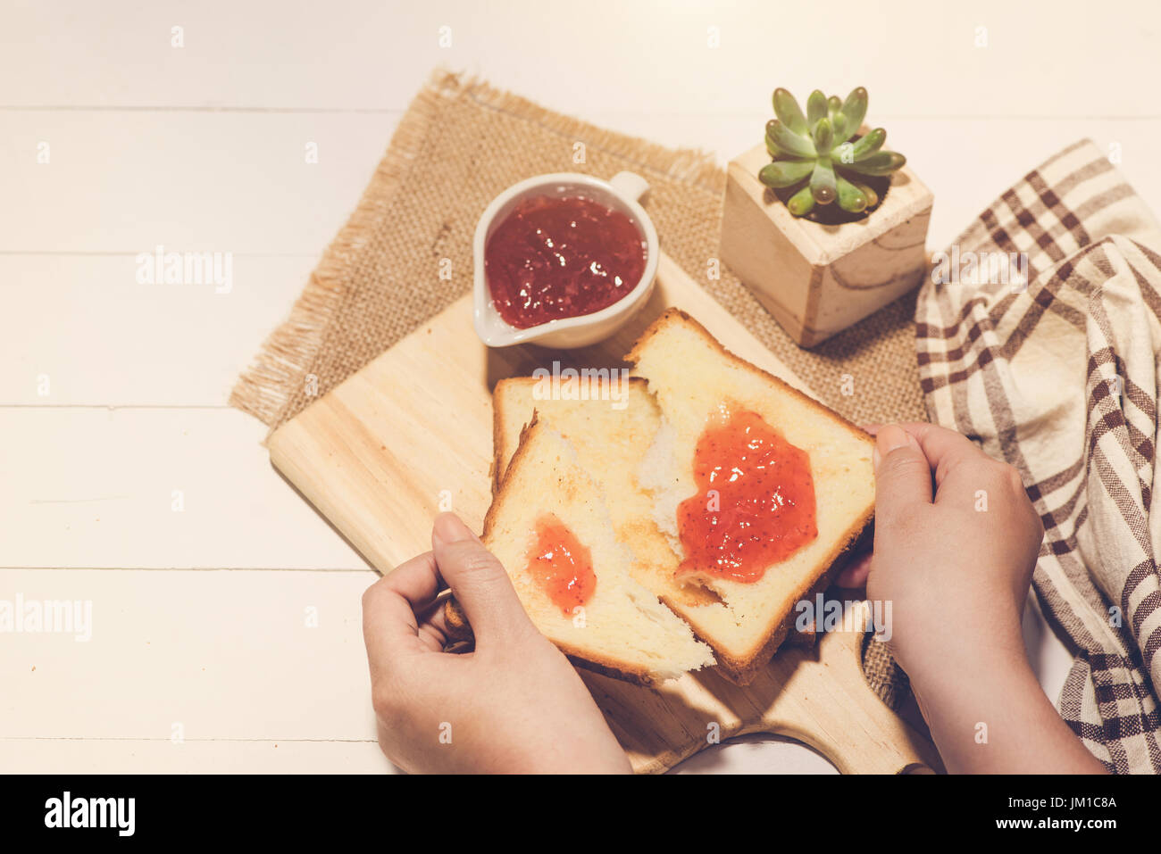 Sliced bread eating woman hi-res stock photography and images - Alamy