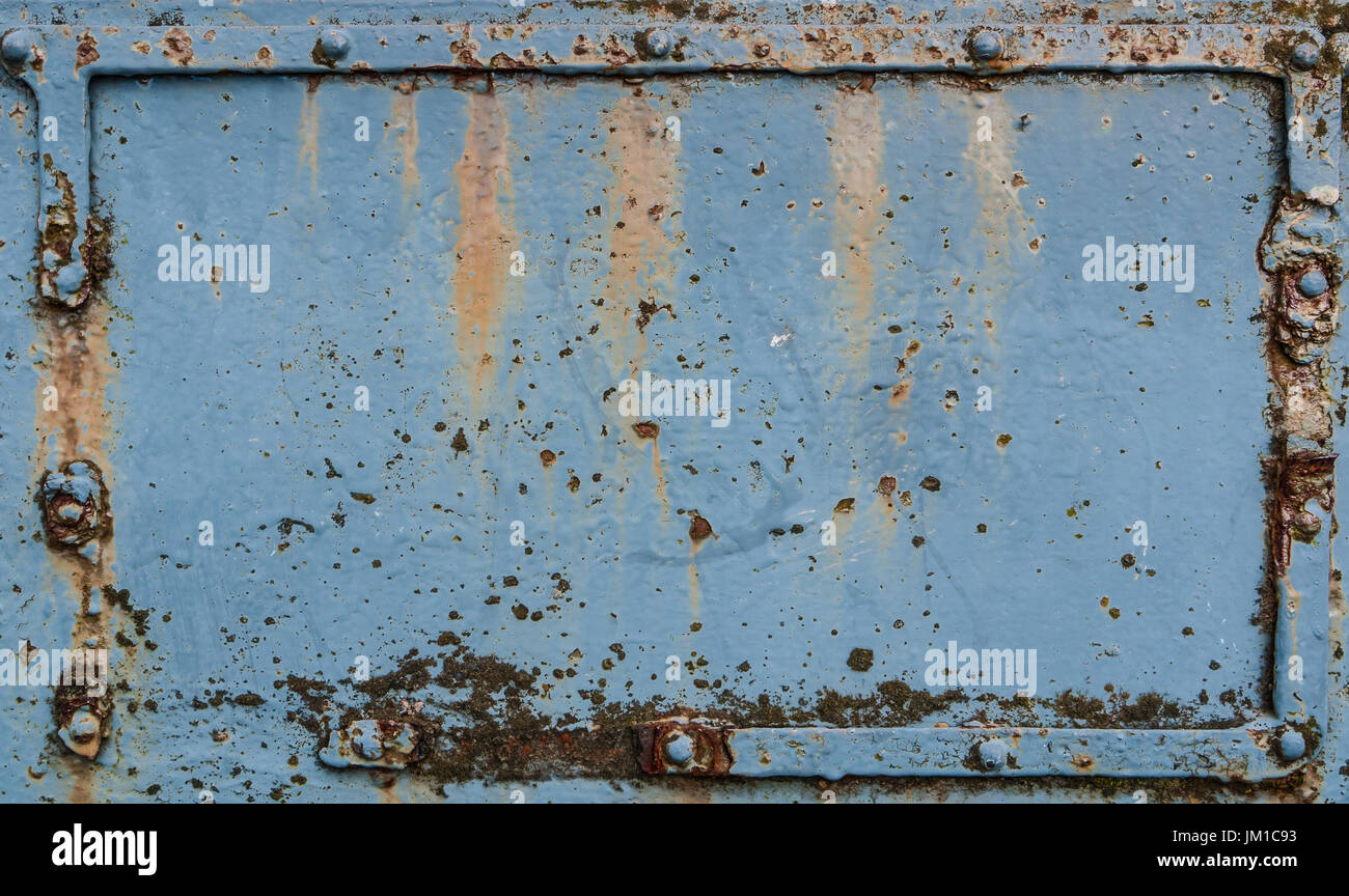 Rusted Metal Plate With Rivets