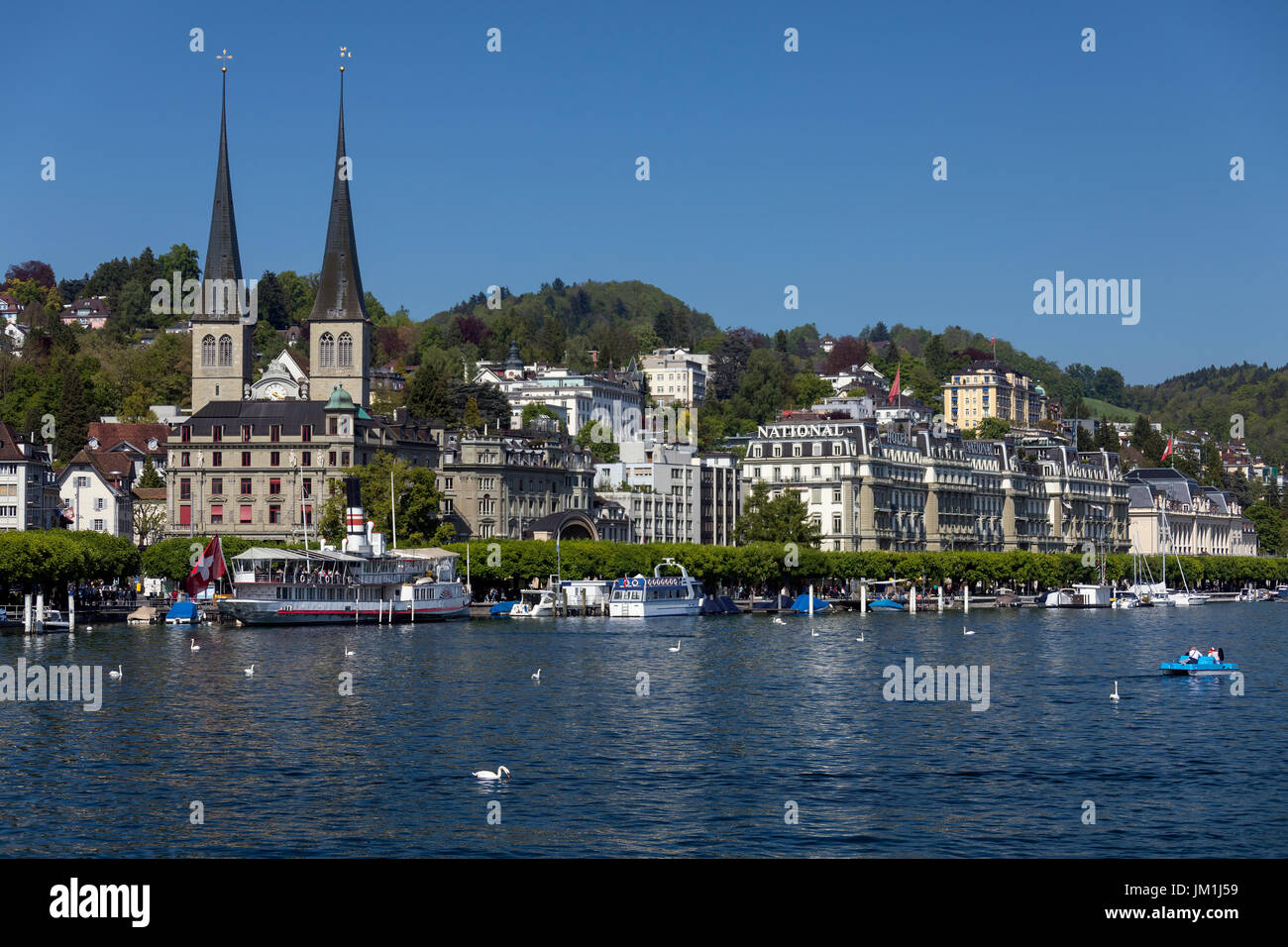 The waterfront and the Hofkirche in the city of Lucerne (Luzurn) in ...