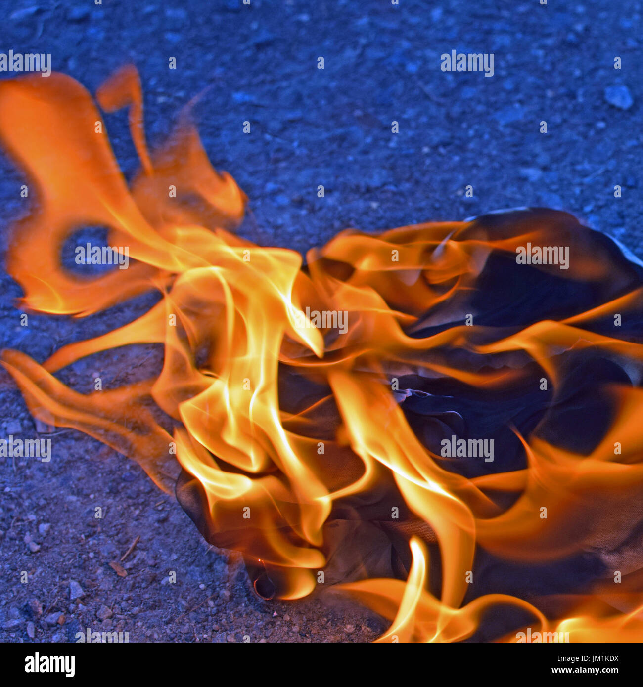 Flames from burning fabric as background Stock Photo - Alamy