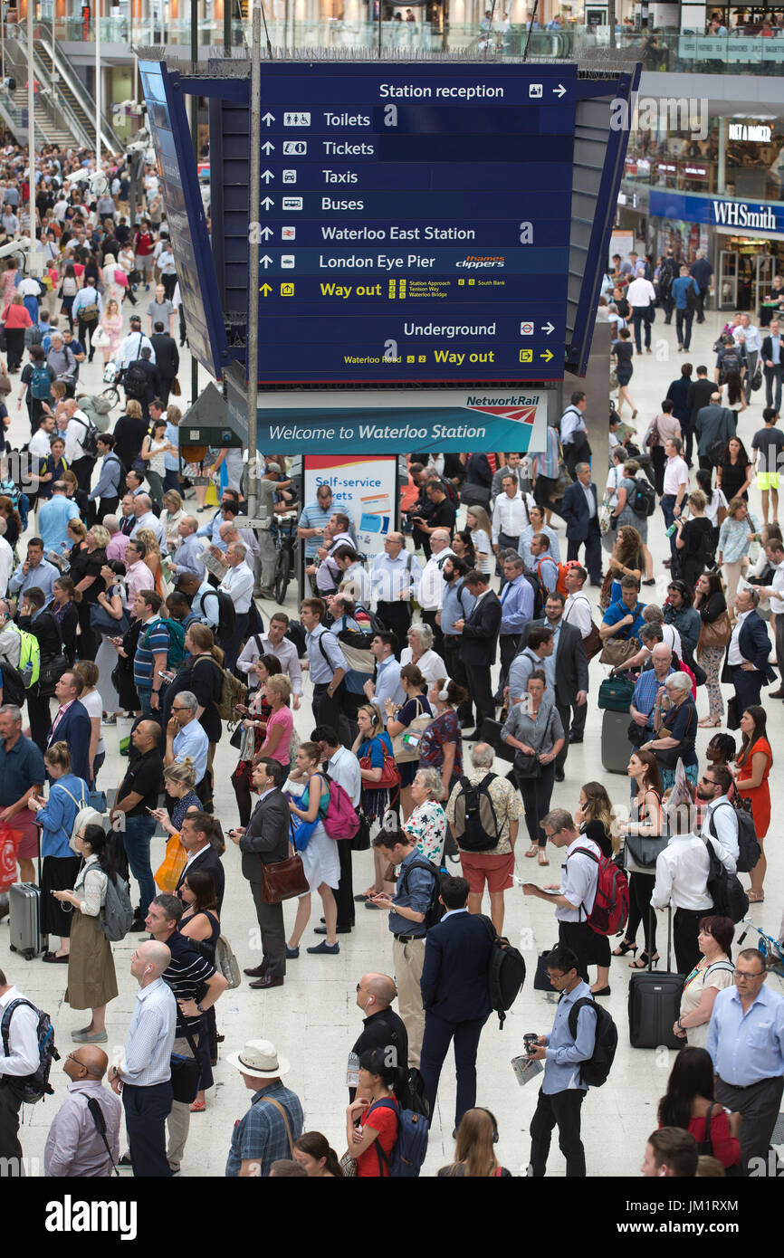 Rail commuters at Waterloo station, thousands of train passengers ...