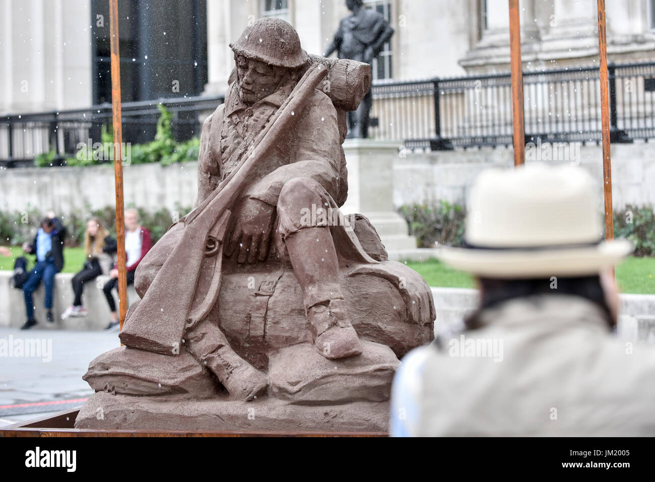 London, UK. 25 July 2017. A sculpture called "The Mud Soldier", by the ...