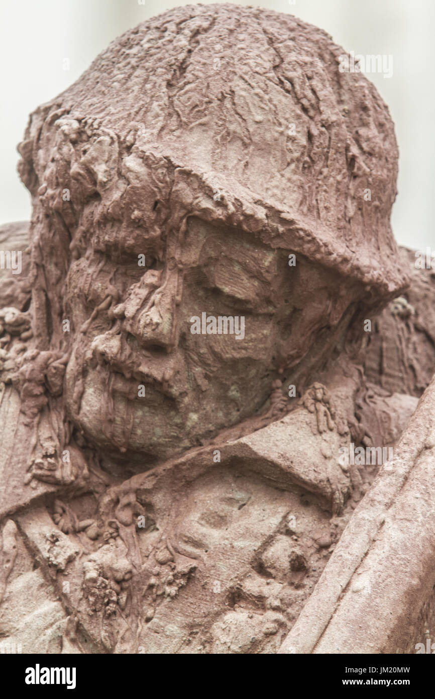 London, UK. 25th July, 2017. The Mud Soldier sculpture in Trafalgar ...