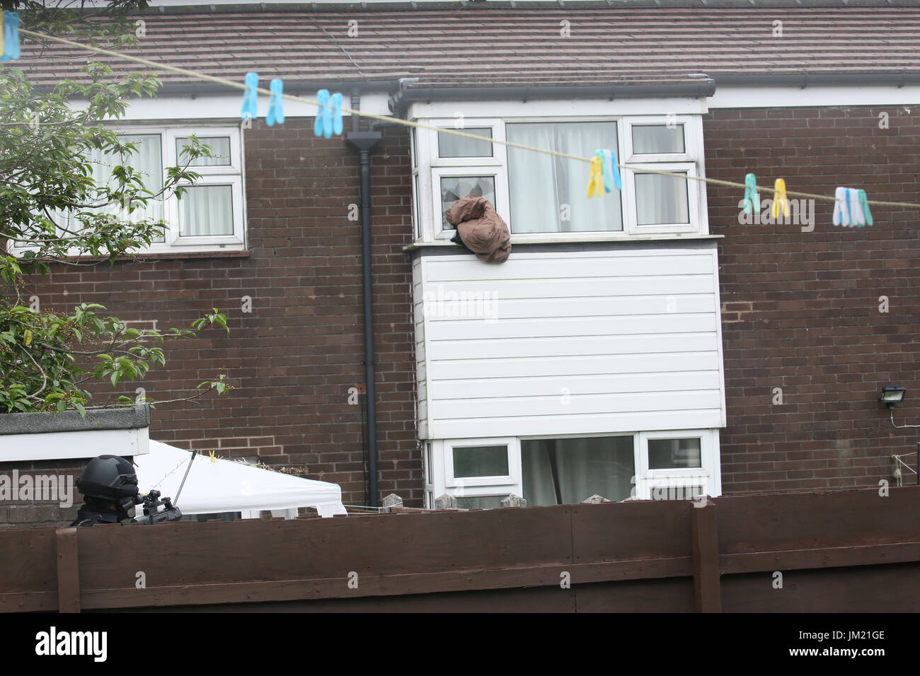 Uk police pointing gun hi-res stock photography and images - Alamy