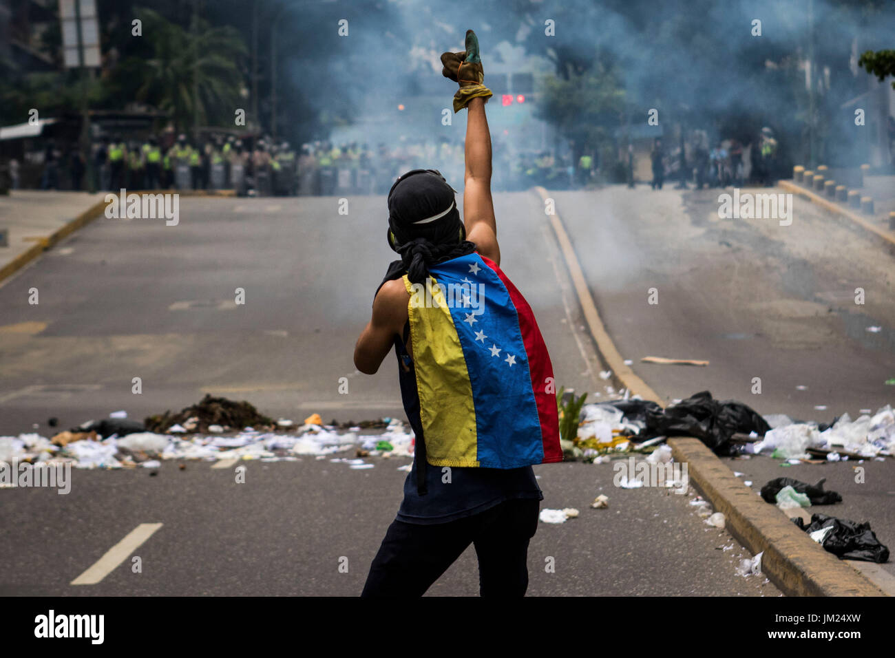 Caracas, Venezuela. 22nd June, 2017. Opposition activists wearing gas ...