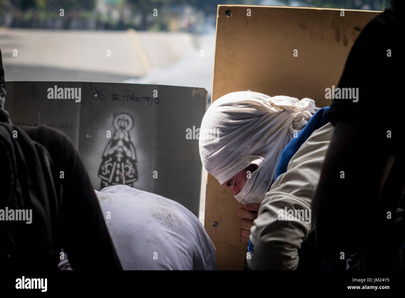 Caracas, Venezuela. 22nd June, 2017. Opposition activists wearing gas ...