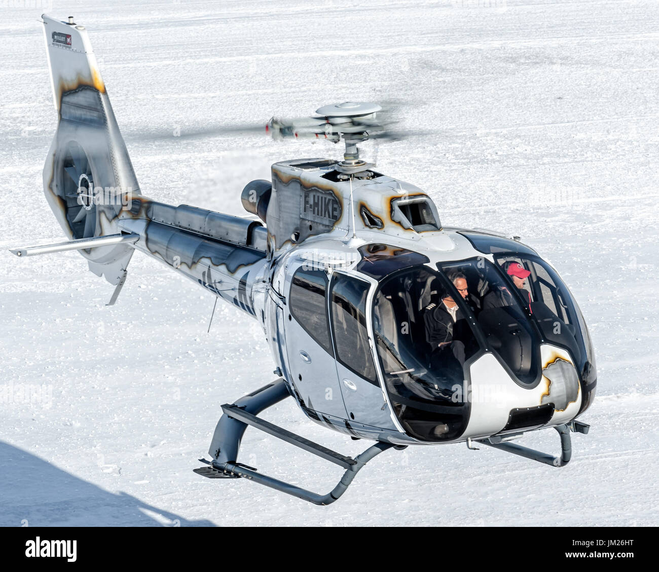 Landing at Courchevel Heliport this EC130 with fantastic colors! Stock ...