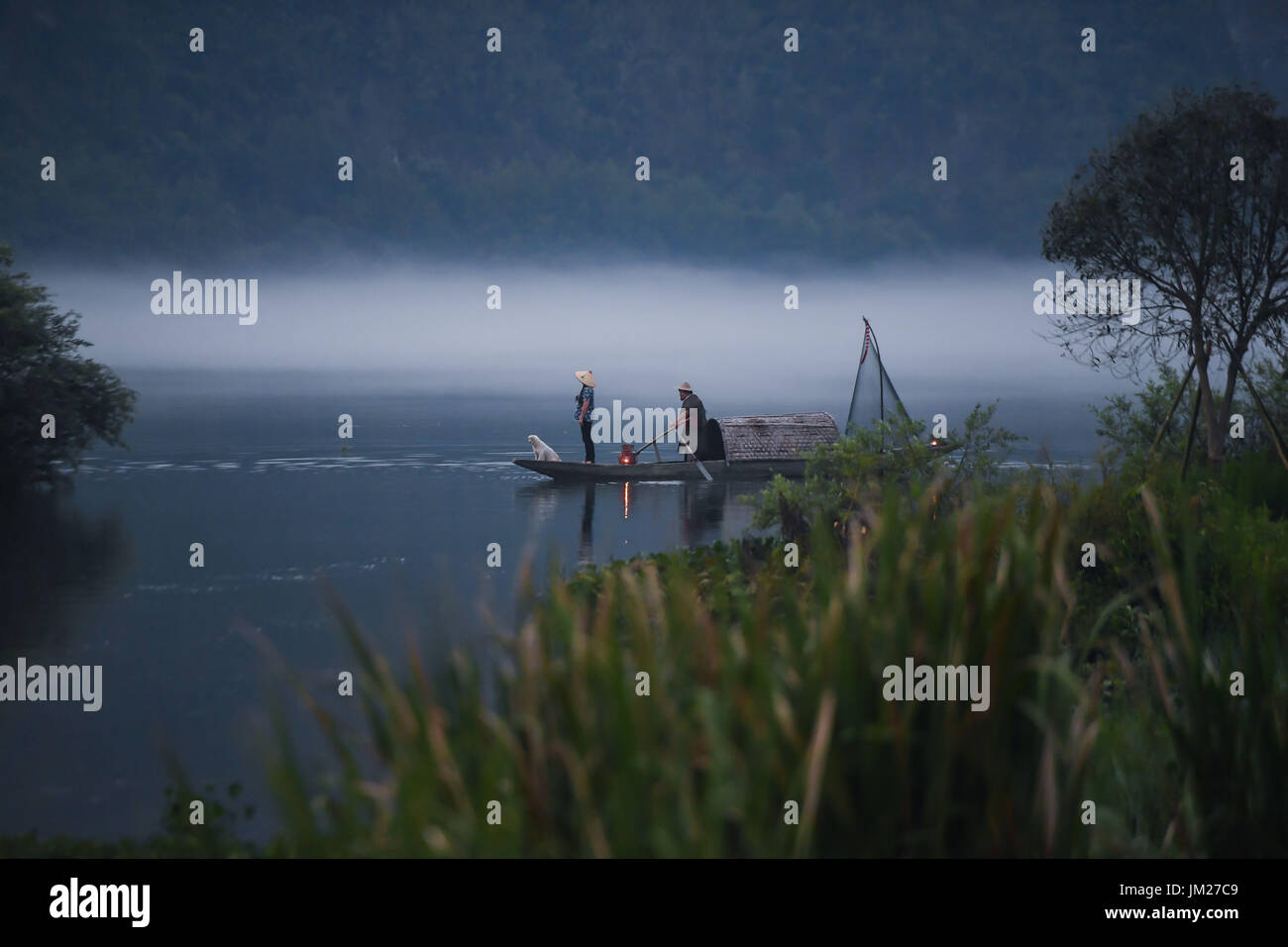 Jiande, China's Zhejiang Province. 26th July, 2017. People take a boat ...
