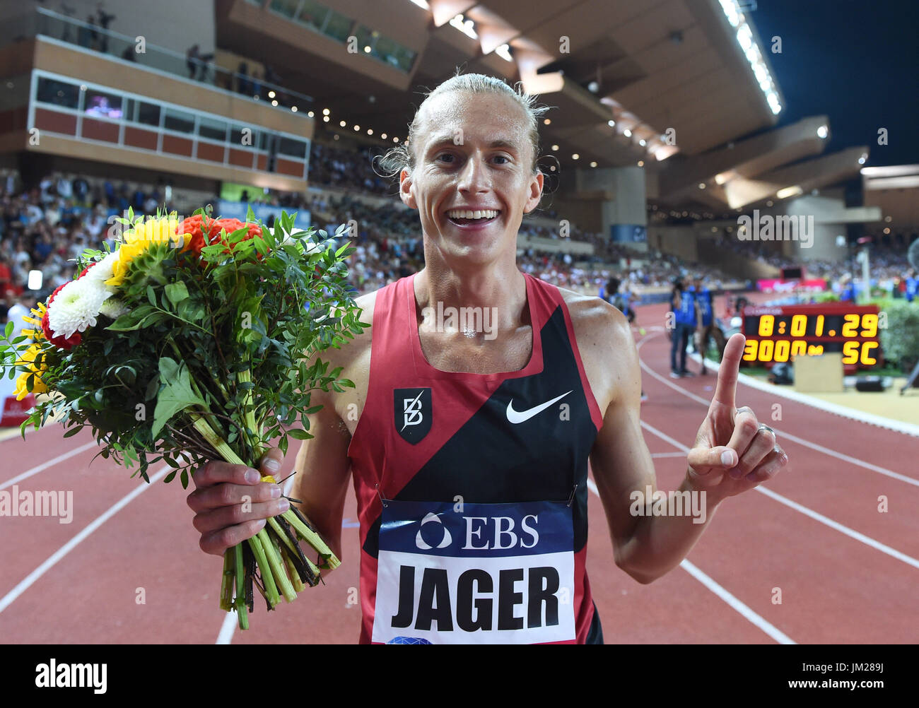 Evan Jager (USA) poses after winning the steeplechase in 8:01.29 in the ...