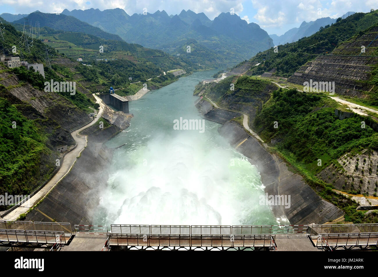 Tian'e. 26th July, 2017. Longtan hydropower station opens its sluice to ...