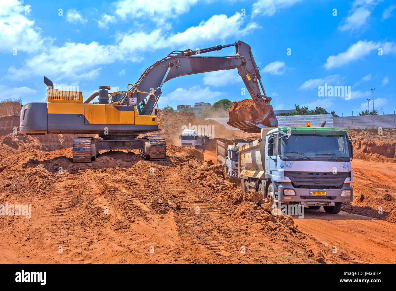 Paving a new road Stock Photo - Alamy