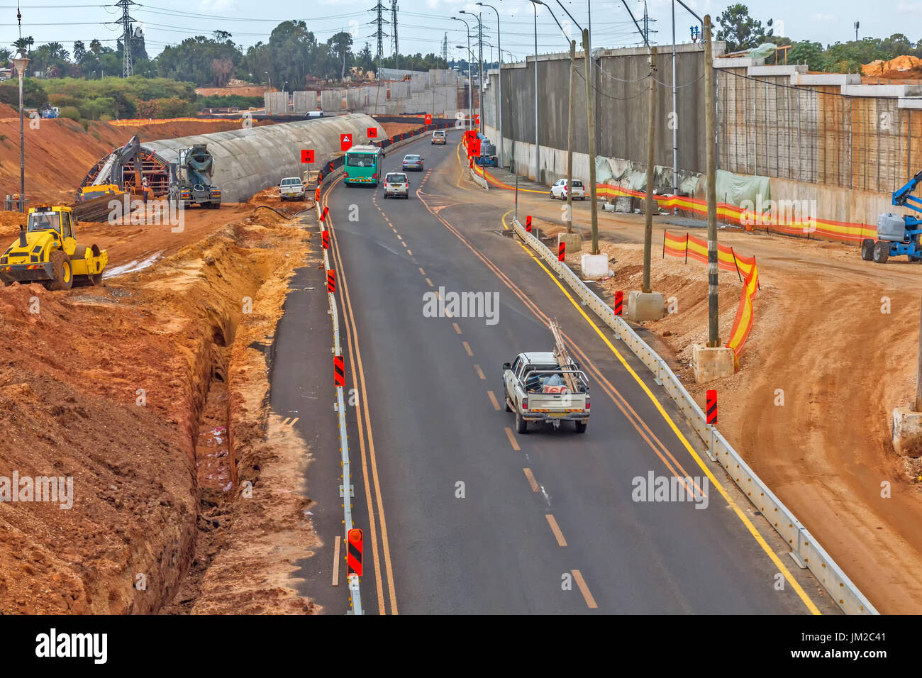 Paving a new road Stock Photo - Alamy