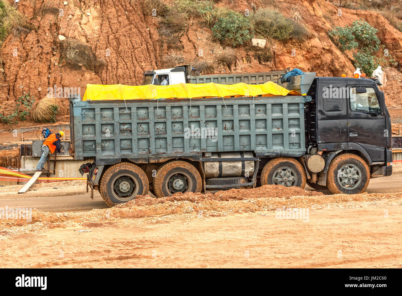 Paving a new road Stock Photo - Alamy