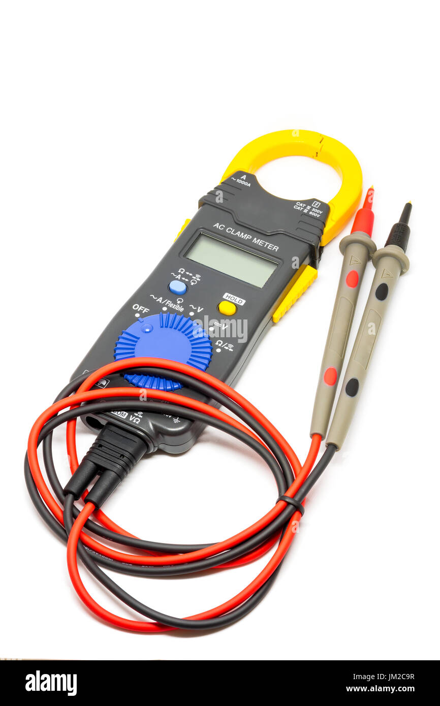 Electric digital multimeter. Clamp digital meter on the white ...