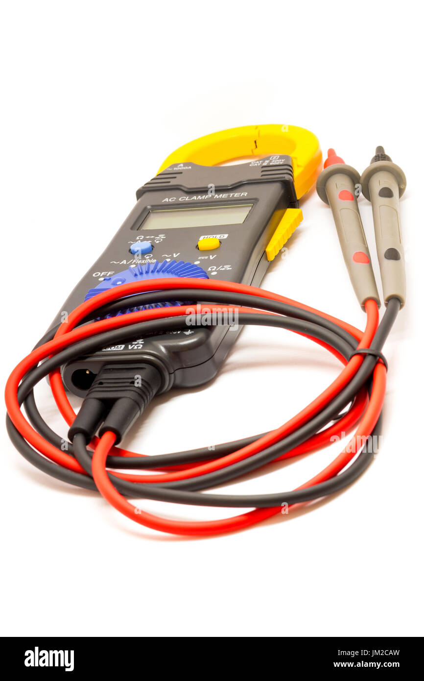 Electric digital multimeter. Clamp digital meter on the white ...