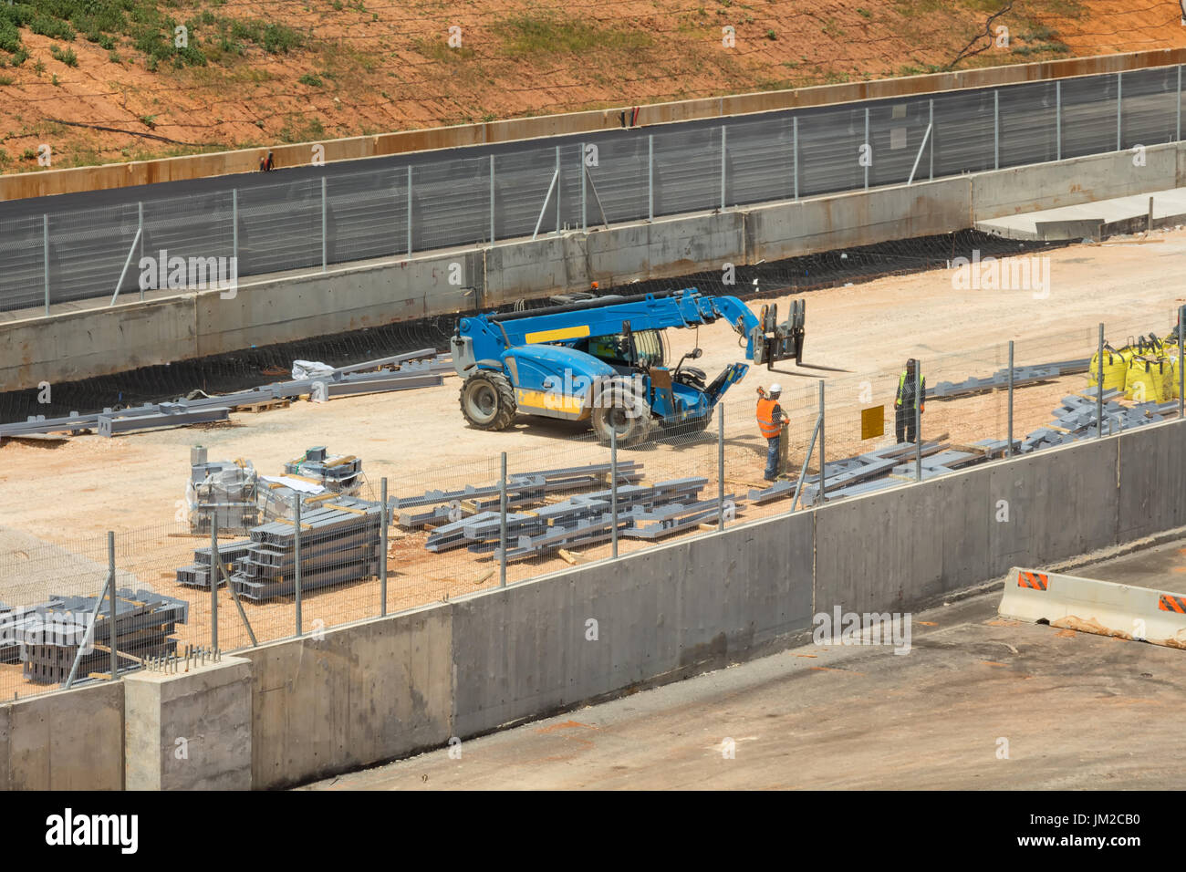 Paving a new road Stock Photo - Alamy