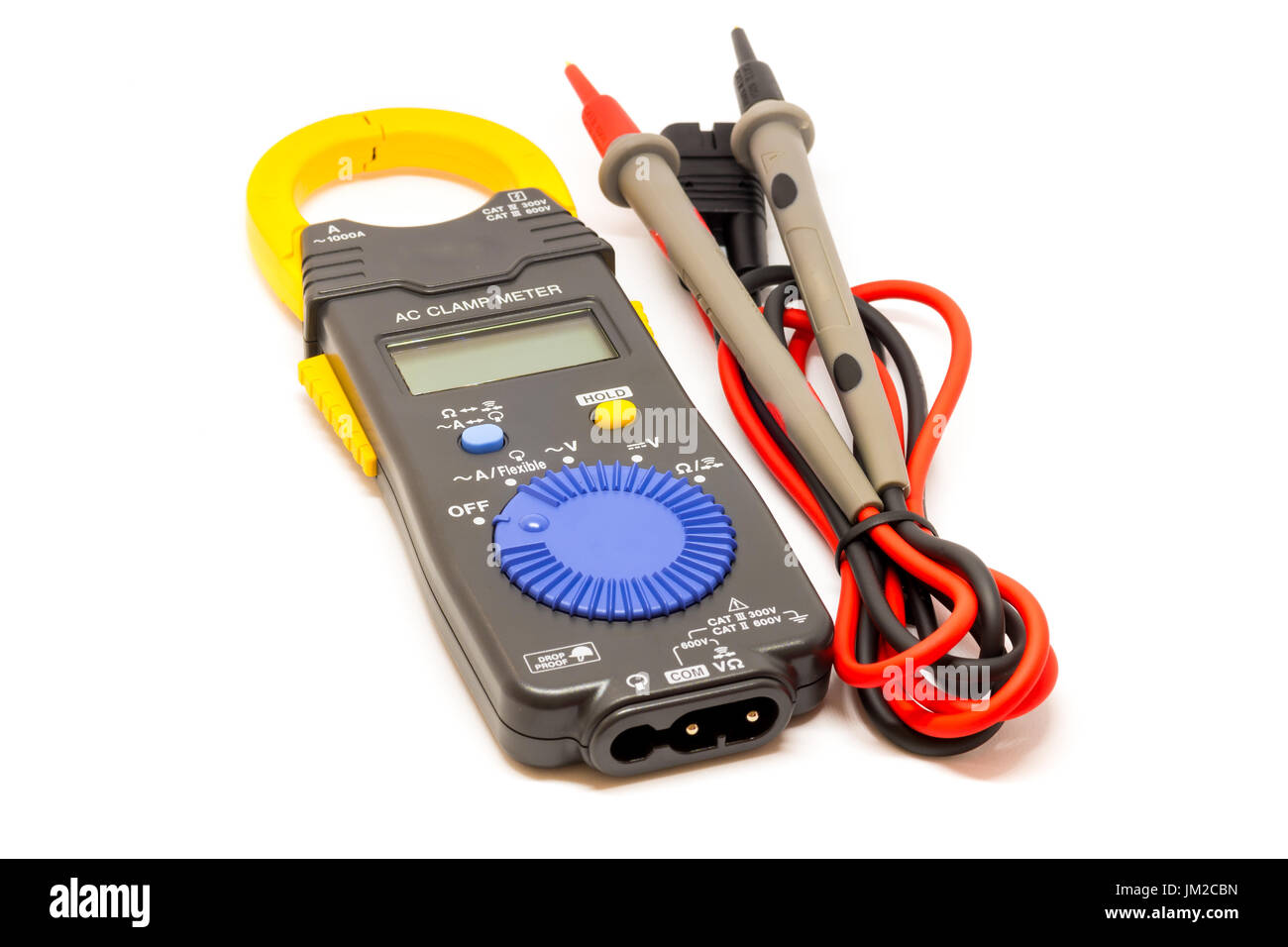Electric digital multimeter. Clamp digital meter on the white ...