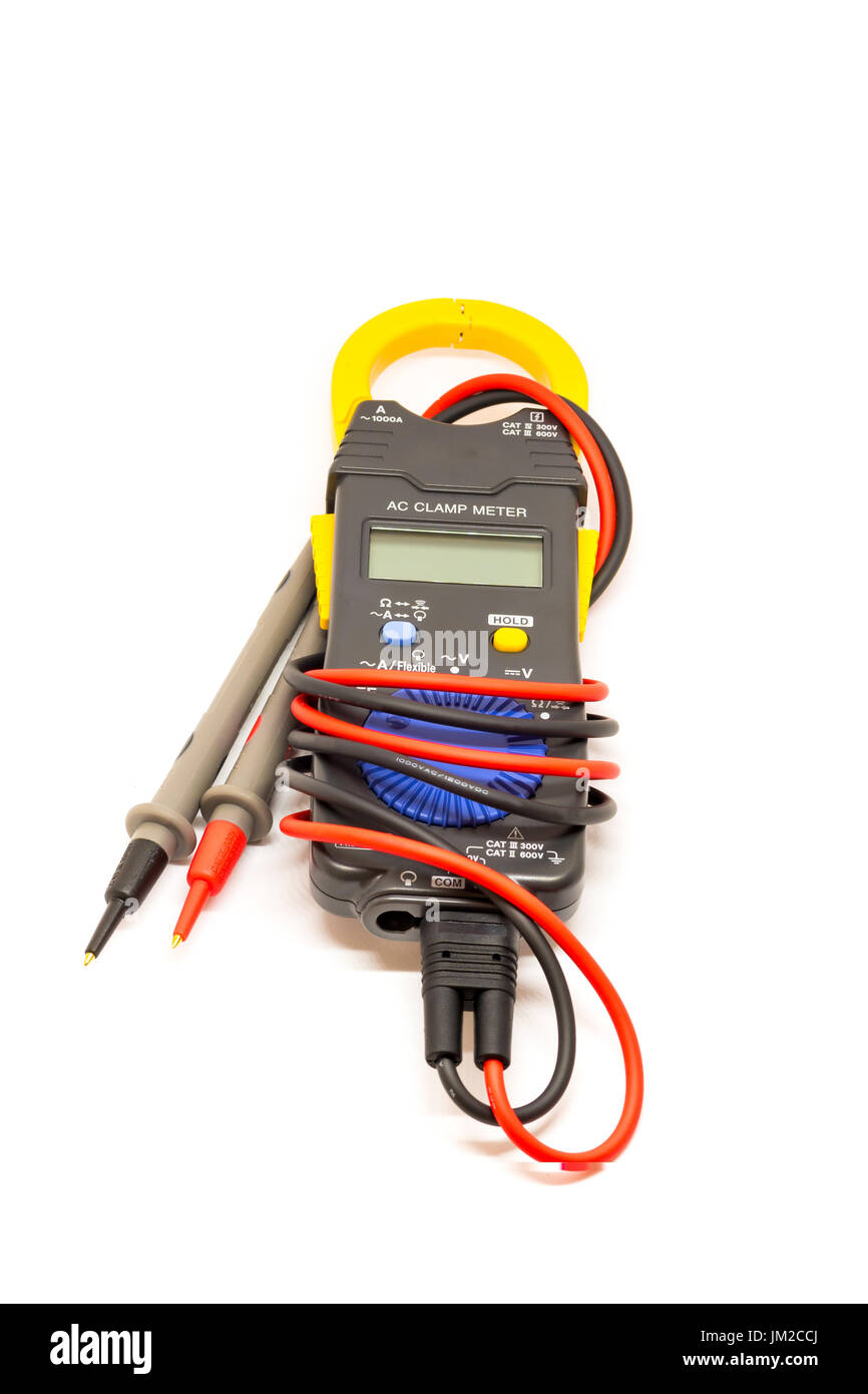 Electric digital multimeter. Clamp digital meter on the white ...