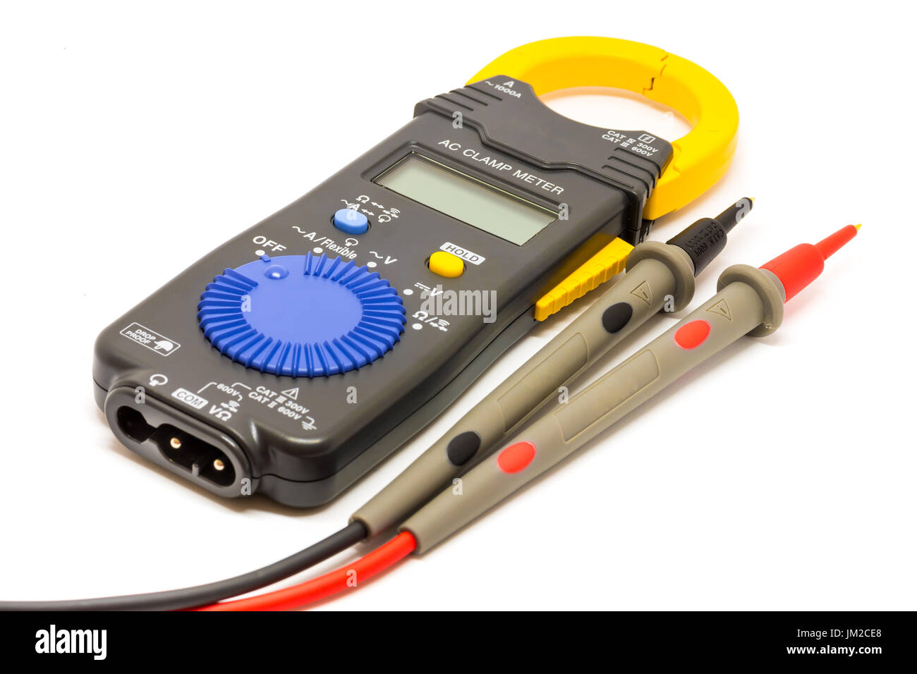 Electric digital multimeter. Clamp digital meter on the white ...