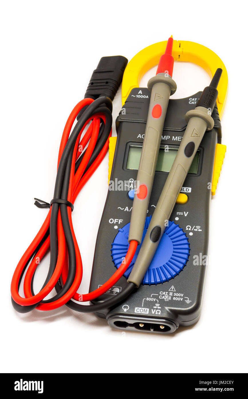 Electric digital multimeter. Clamp digital meter on the white ...