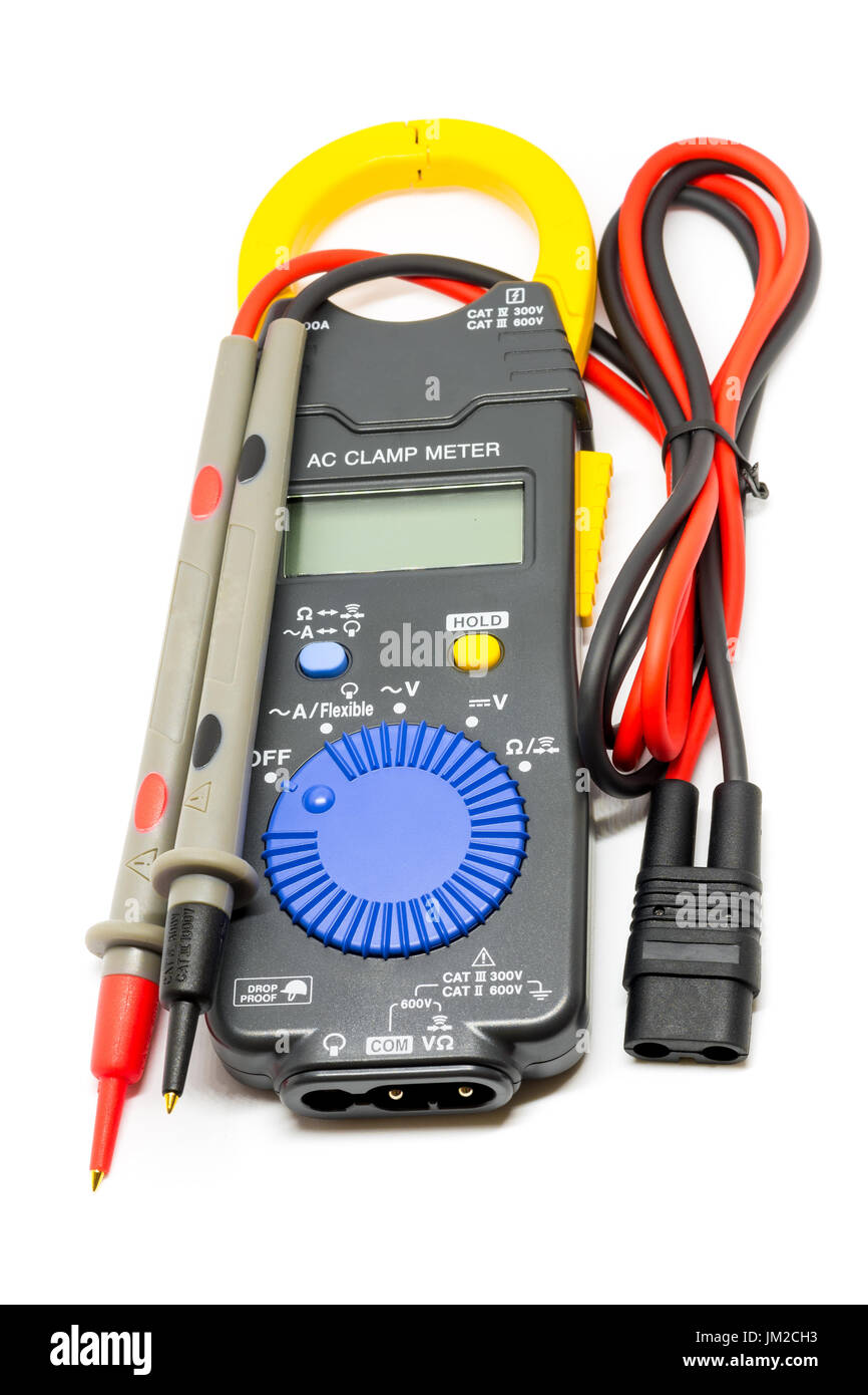 Electric digital multimeter. Clamp digital meter on the white ...
