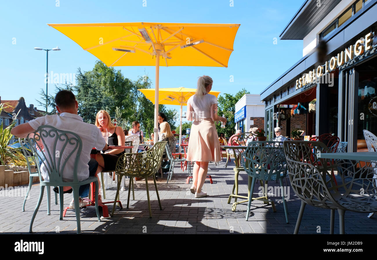 People outside newly opened Establo Cafe Bar enjoying the warm summer ...