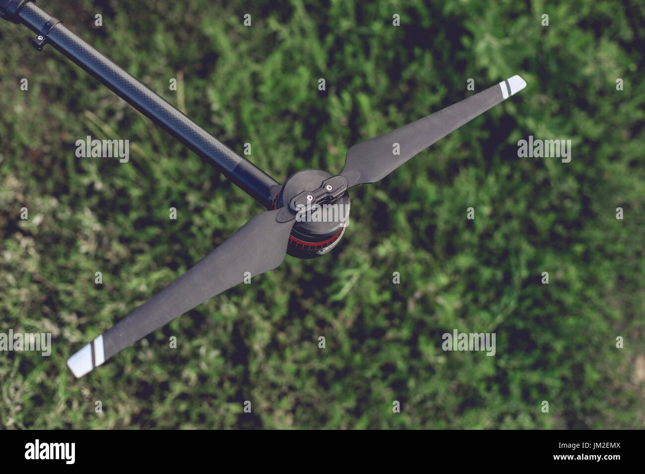 Black drone arm with small engine and air screw on the top Stock Photo ...
