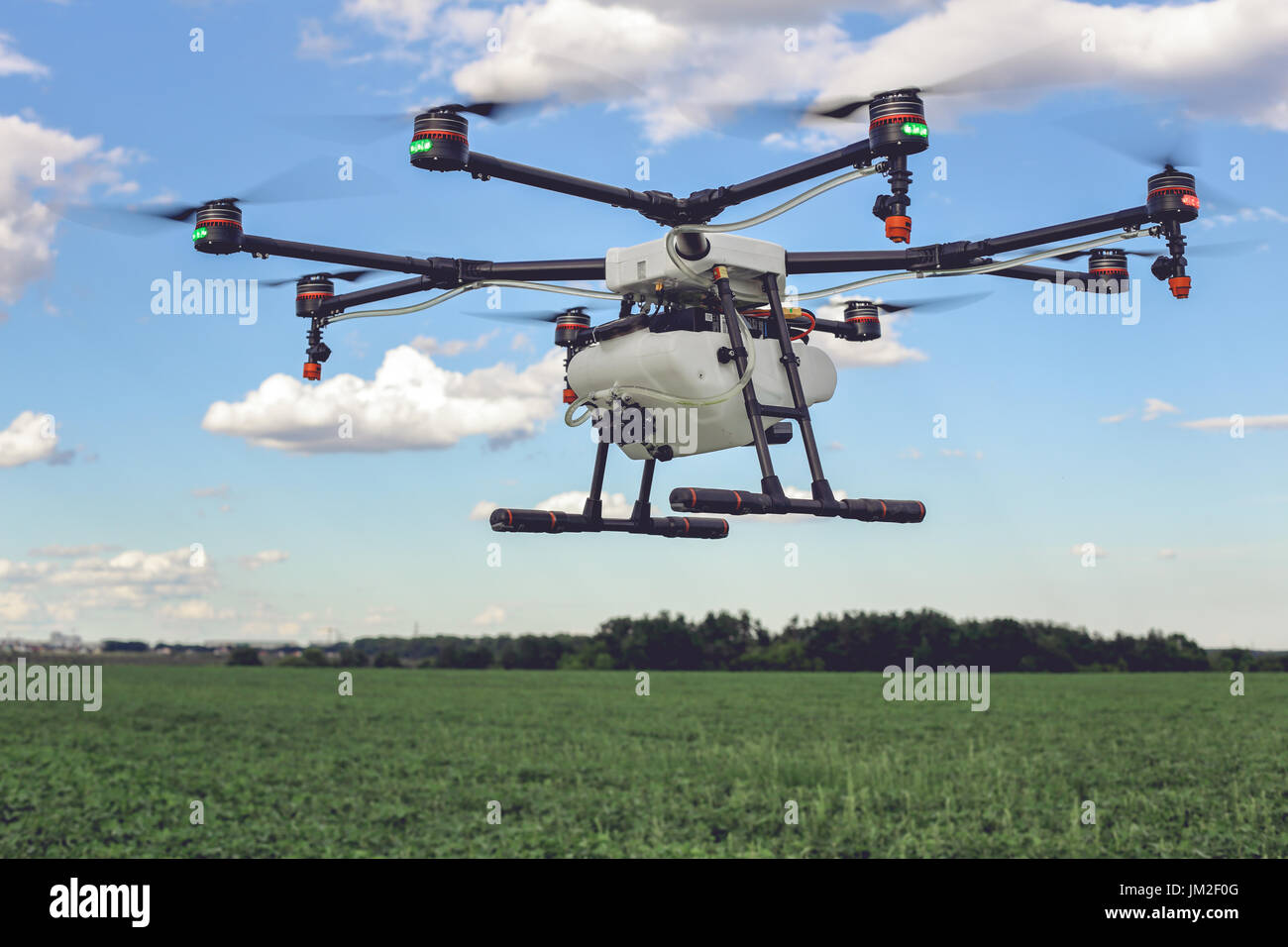 Professional agricultural drone flying above hi-res stock photography ...